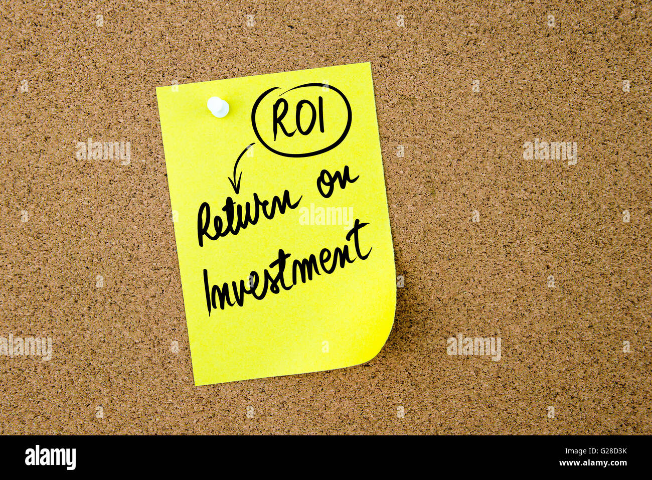 Business Acronym ROI Return On Investment written on yellow paper note ...