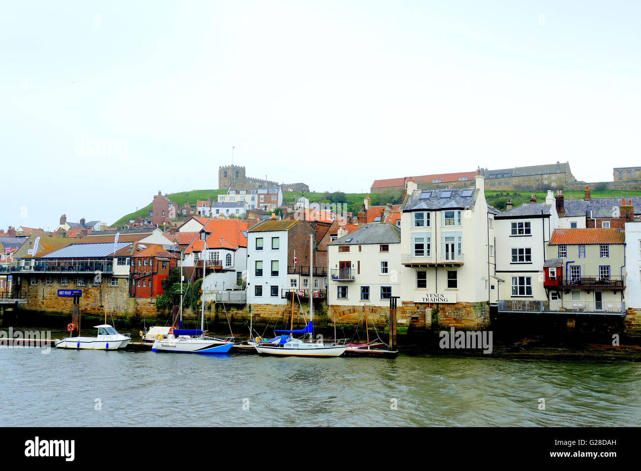 WHITBY, YORKSHIRE, UK. MAY 12, 2016. The old town and River" Esk" with ...