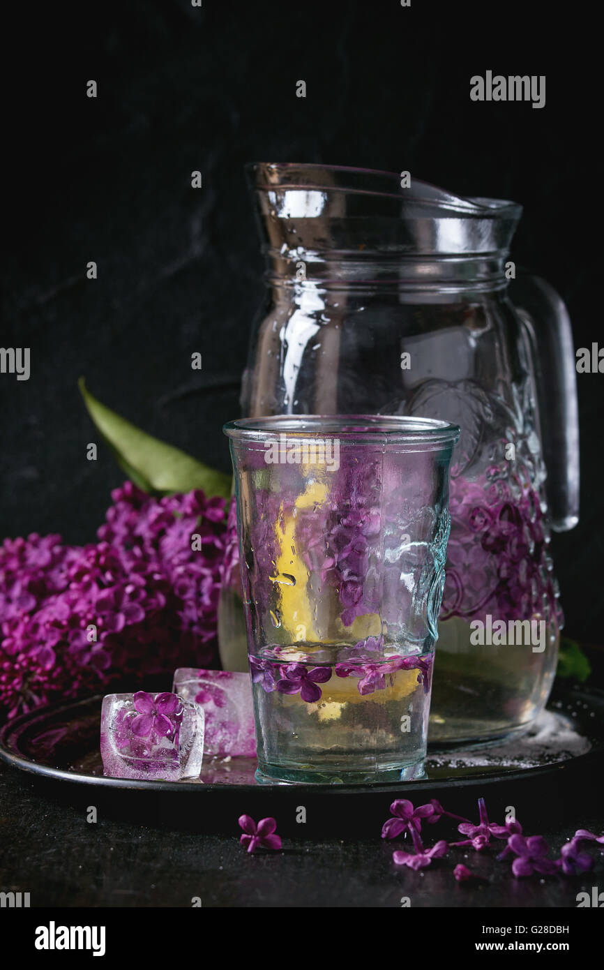 Lilac water with lemon Stock Photo - Alamy