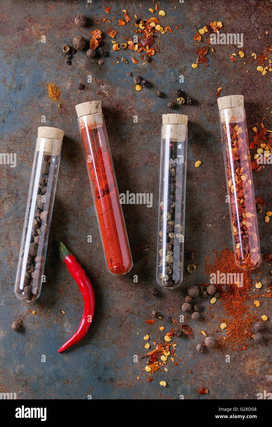 Spicy background with chili peppers Stock Photo - Alamy