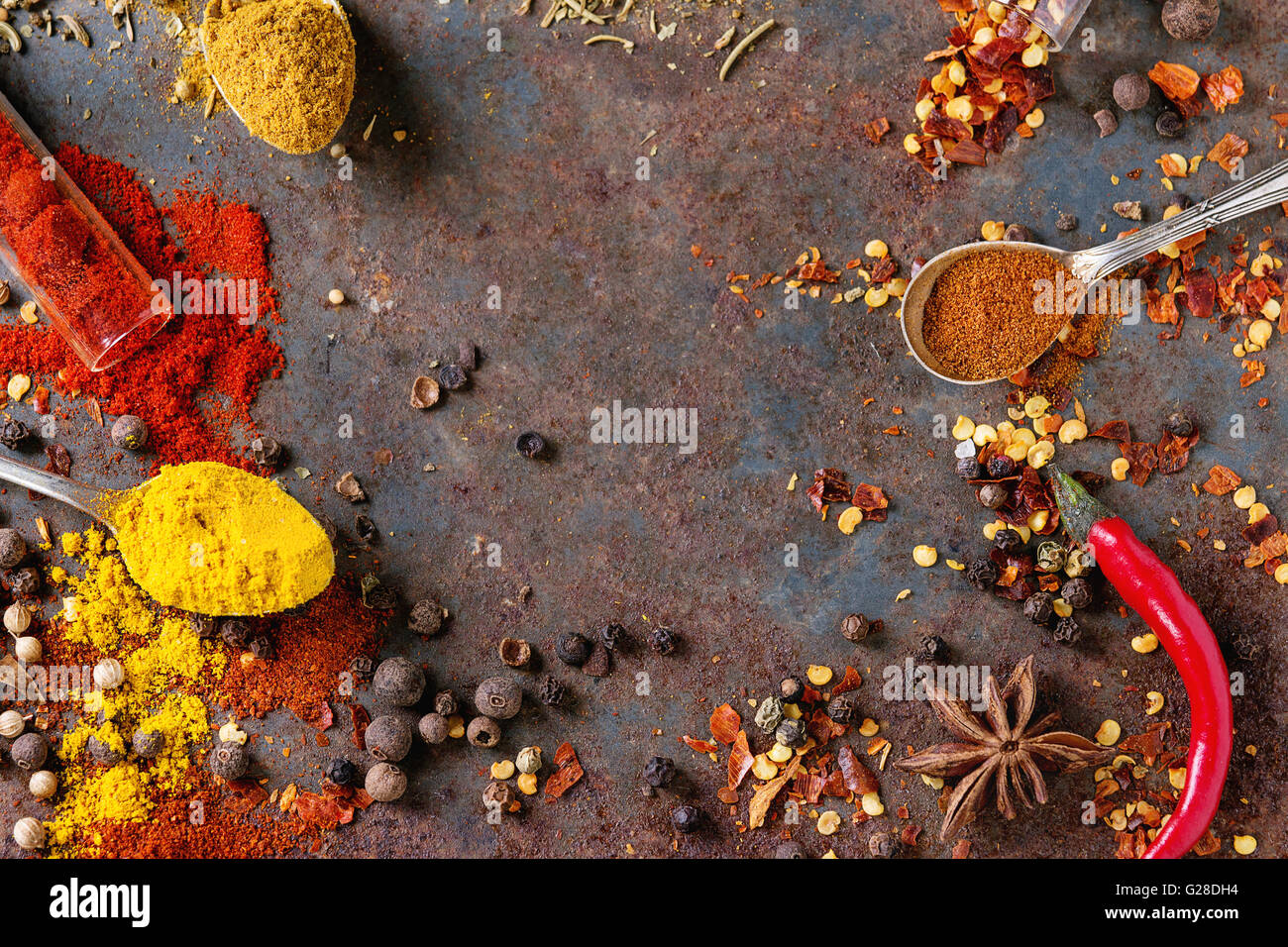 Spicy background with chili peppers Stock Photo - Alamy