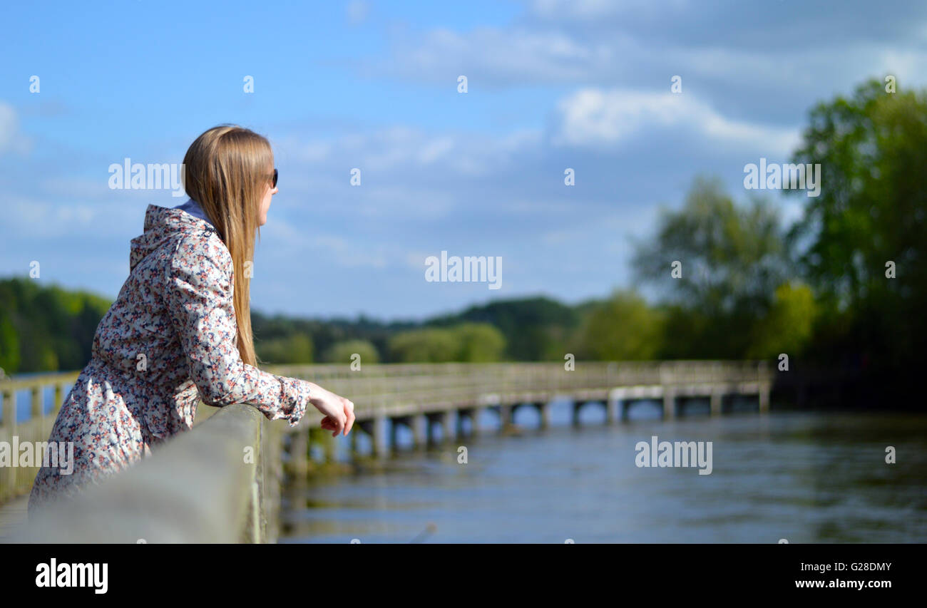 Woman girl walking bridge river hi-res stock photography and images - Alamy