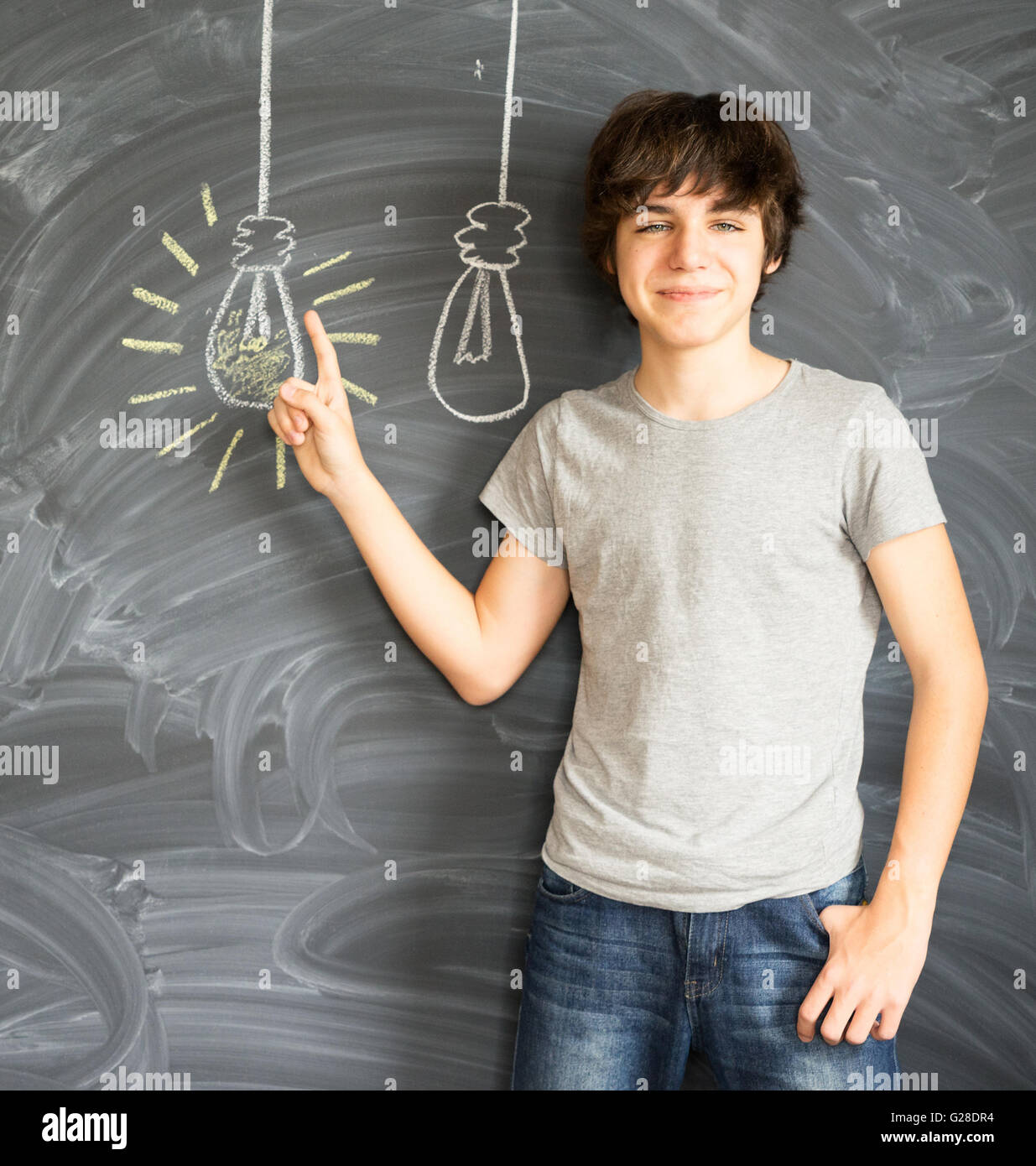 Teenager boy getting an idea Stock Photo - Alamy