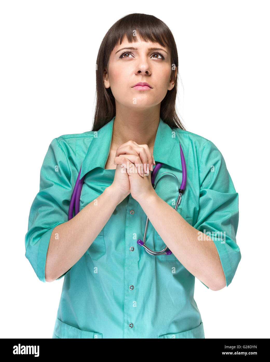 Young woman medical doctor praying, isolated on white background Stock ...
