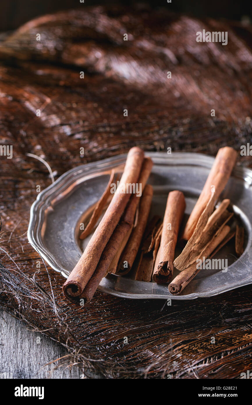 Cinnamon sticks on plate Stock Photo - Alamy
