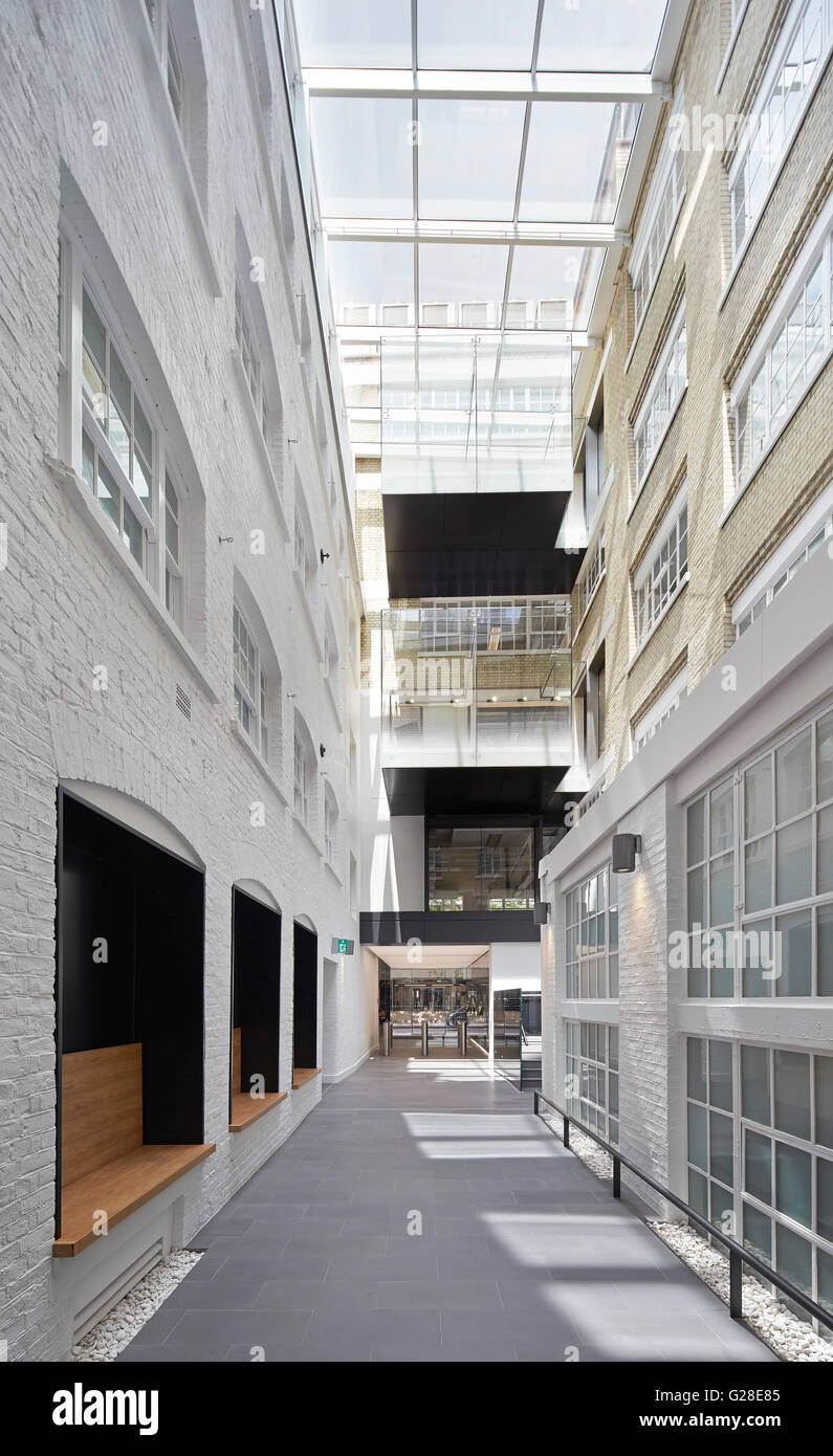 Internal street connecting building volumes. Heal's, Torrington Place ...