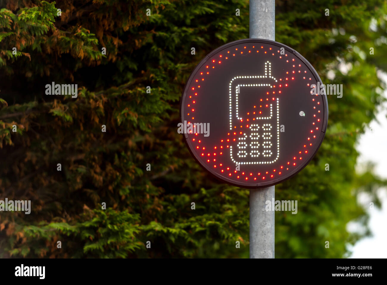New road sign which detects when a mobile phone is being used in a ...