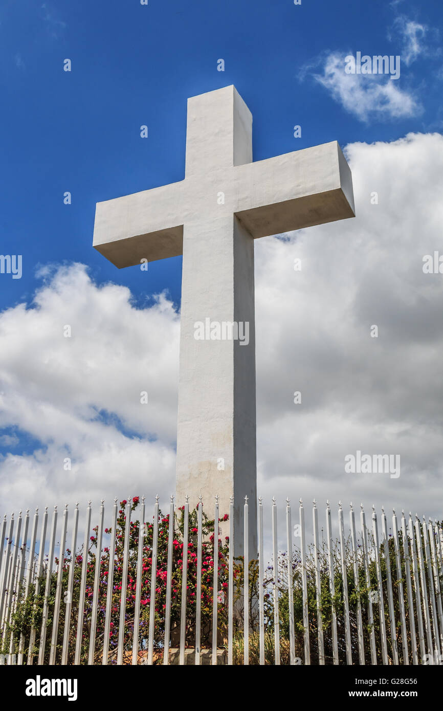 The historic Mt. Helix cross surrounded by fence railing, with a ...
