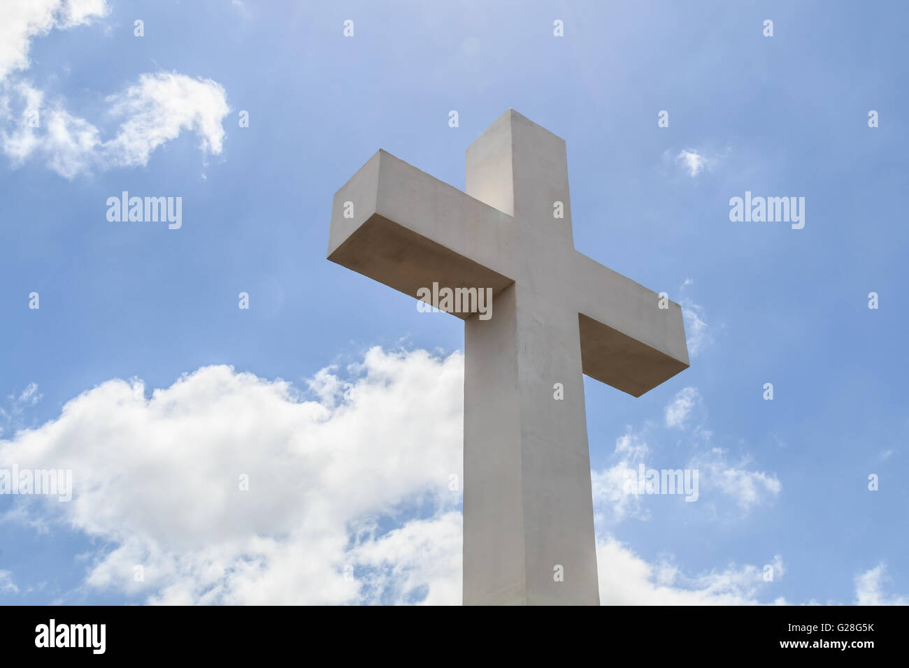 Sun rays from above shining on the historic Mt. Helix cross with a ...