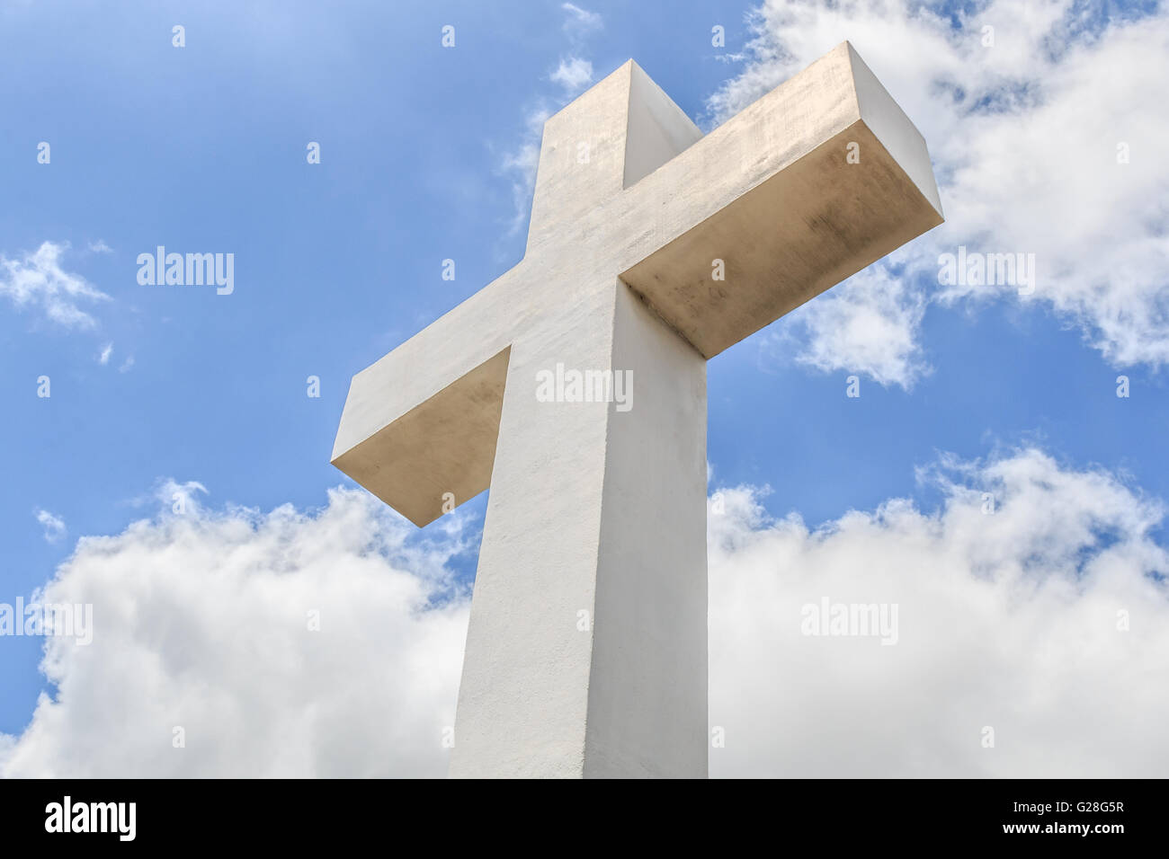 The historic Mt. Helix cross with a cloudy blue sky in La Mesa, a city ...