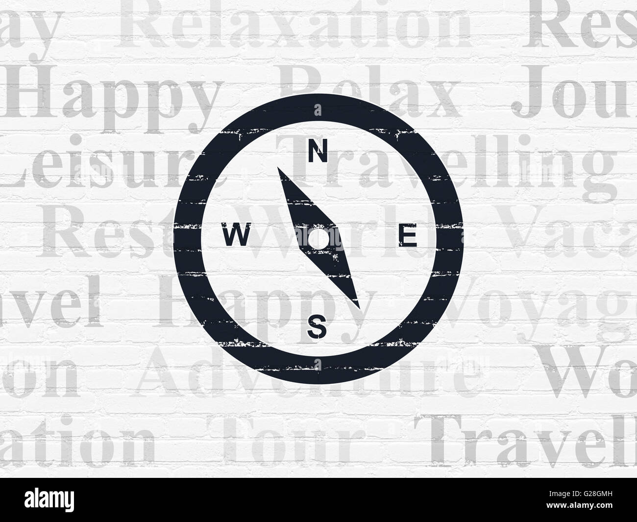 Travel concept: Compass on wall background Stock Photo - Alamy