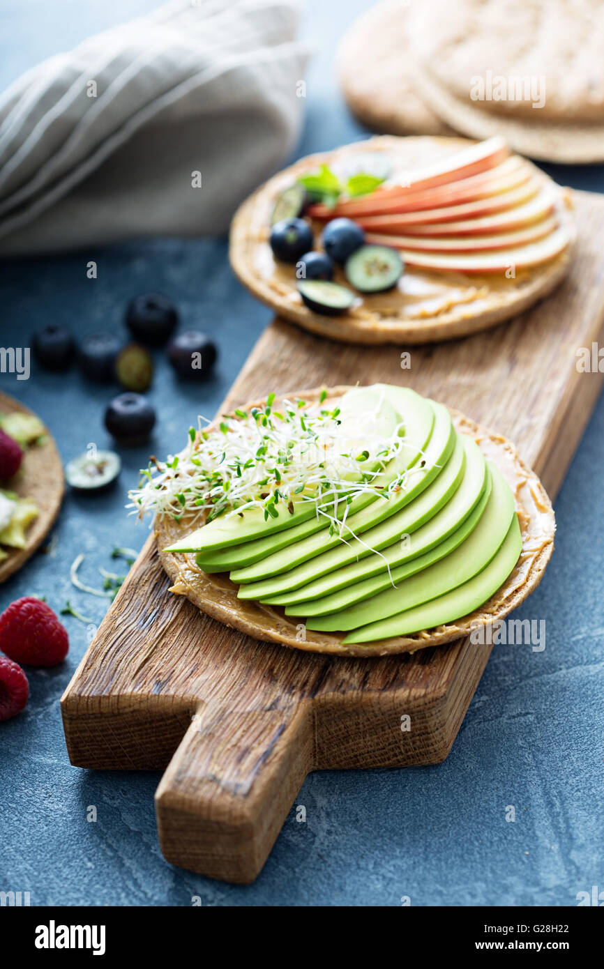 Wholegrain bread with variety of toppings Stock Photo - Alamy