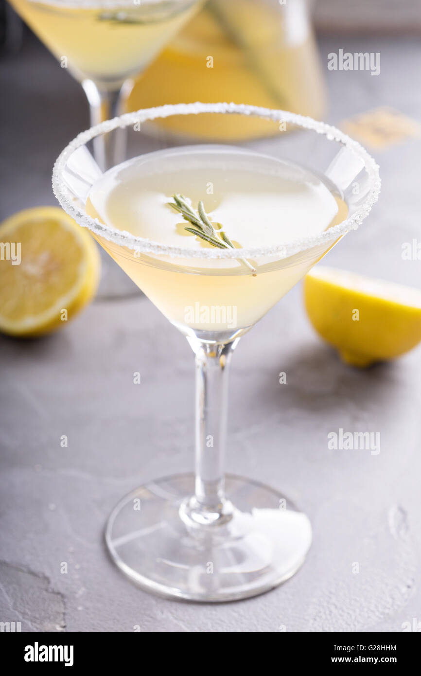 Lemonade martini with rosemary Stock Photo - Alamy