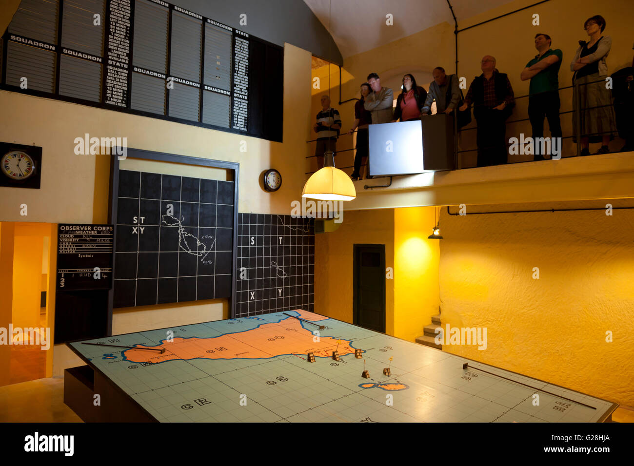A group of visitors at the air defence room in the underground complex ...