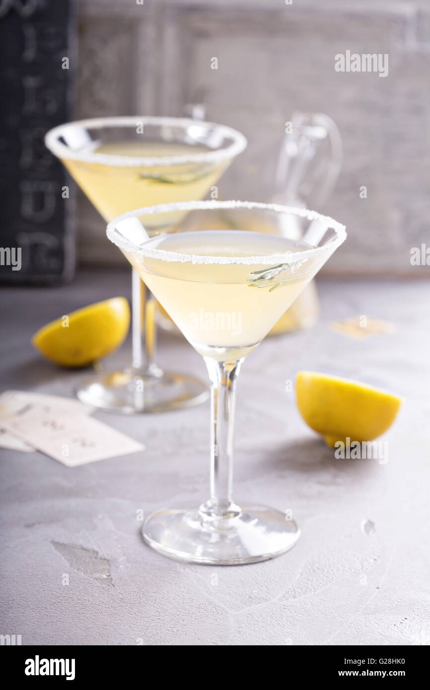 Lemonade martini with rosemary Stock Photo - Alamy