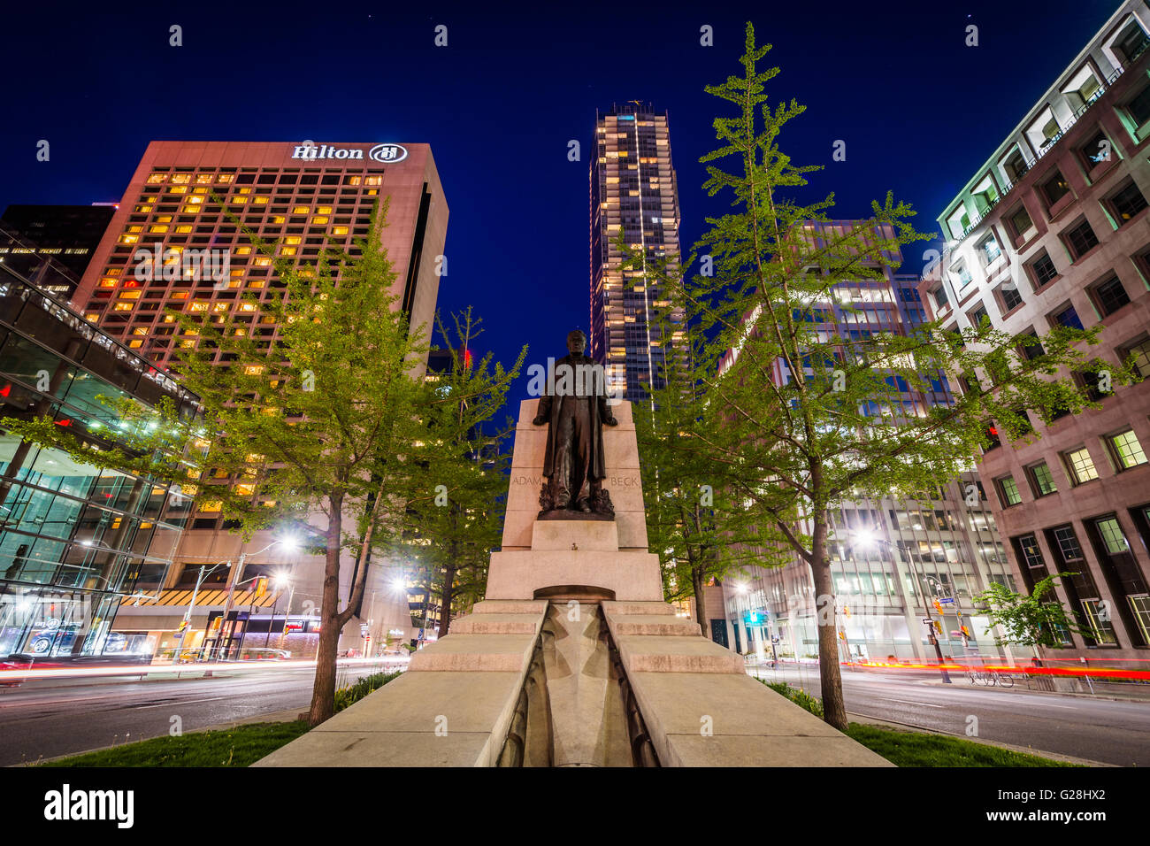 Statue of Adam Beck in the median of University Avenue, and modern ...