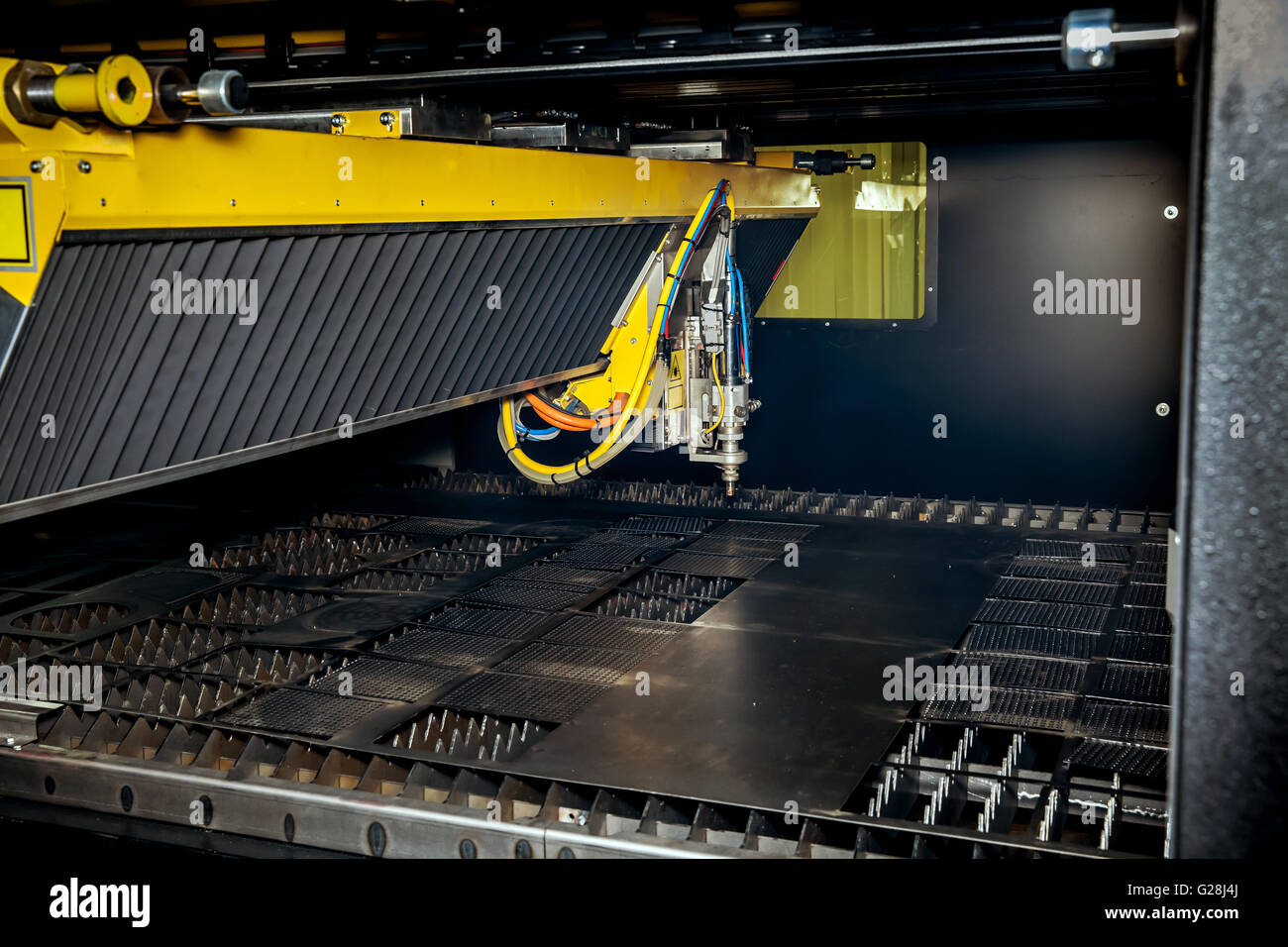 Machine for constant metal laser cutting, metal processing close up ...
