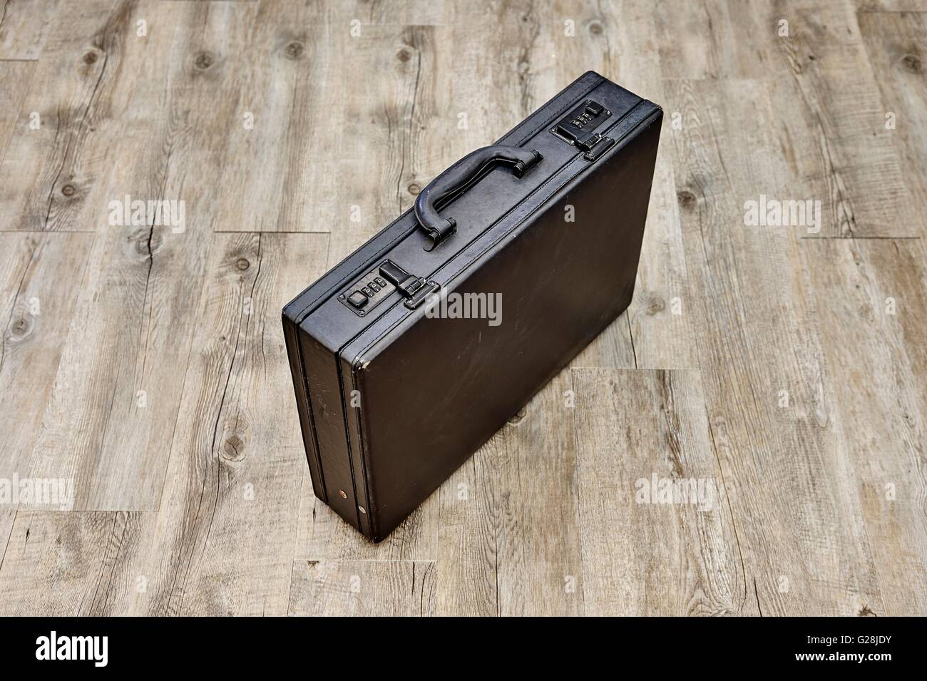 A studio photo of an old leather briefcase Stock Photo - Alamy