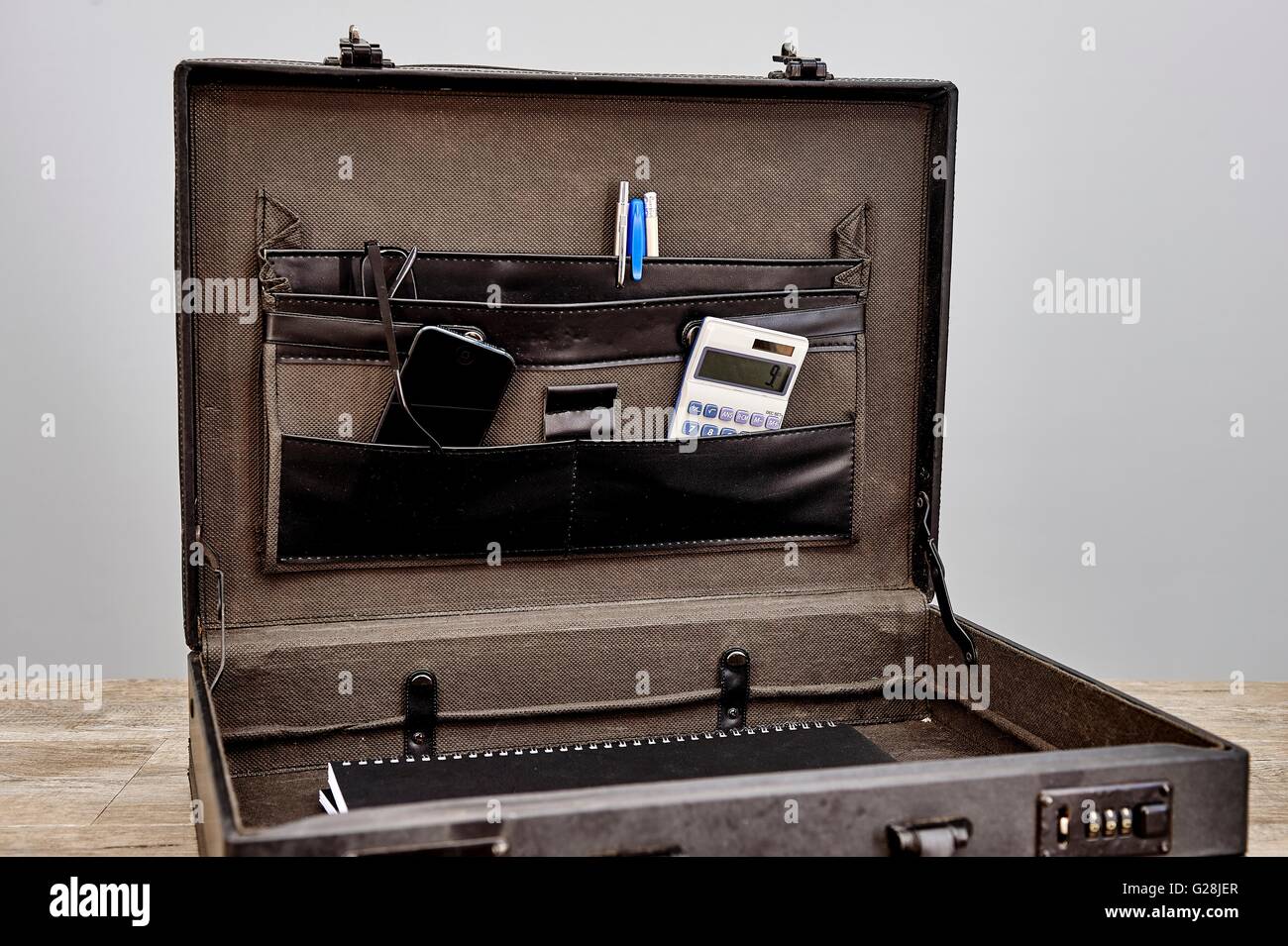 A studio photo of an old leather briefcase Stock Photo - Alamy