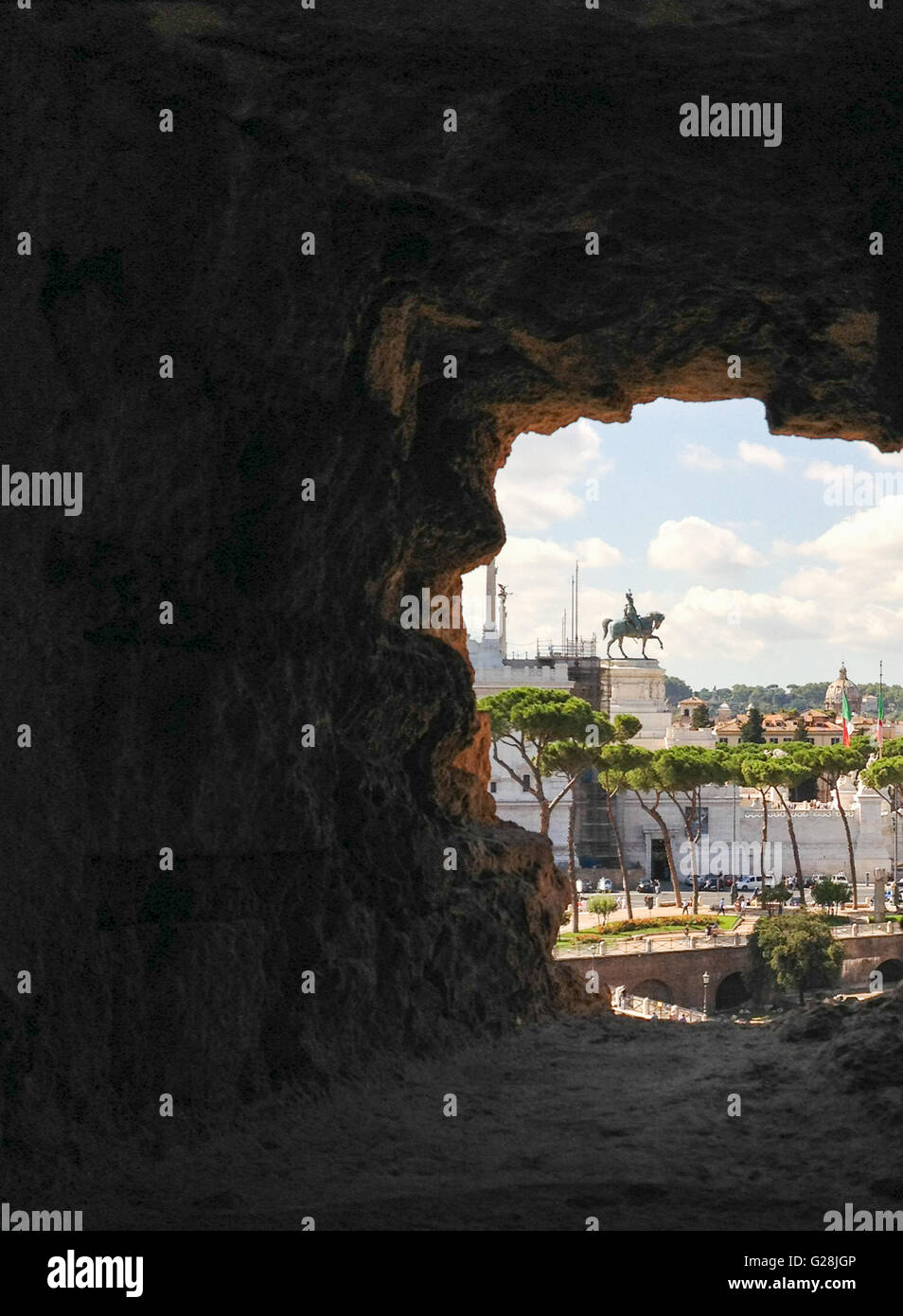 a shot through a thick stone wall of a section of Rome near the ...