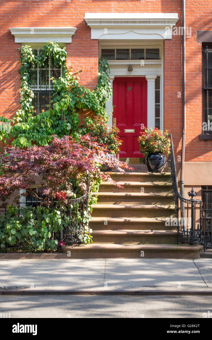 A classic old brownstone home on Perry Street in Greenwich Village in ...