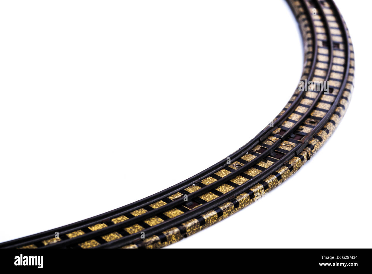 Small section of toy rail track, with a curve Stock Photo - Alamy
