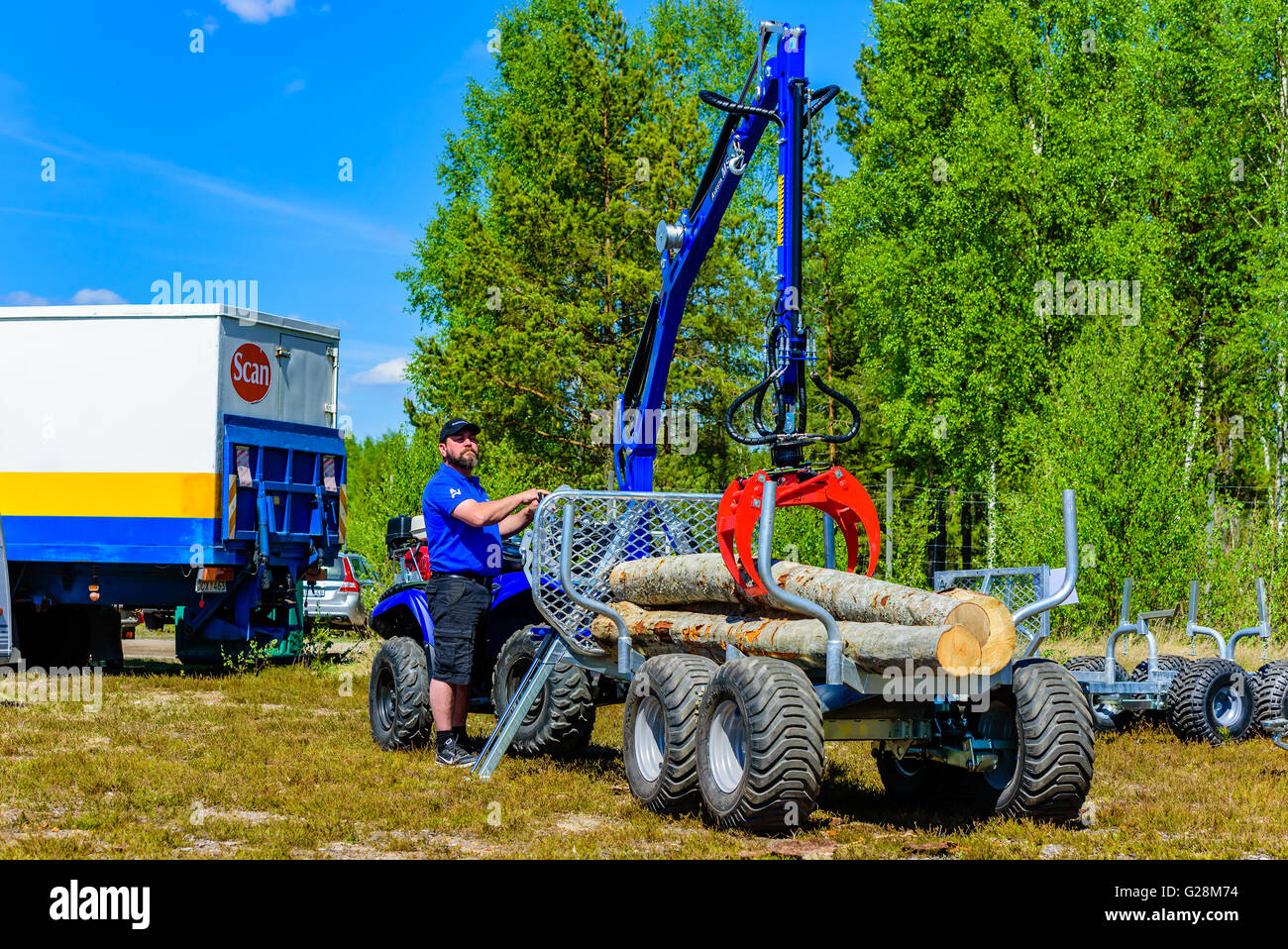 Emmaboda, Sweden - May 13, 2016: Forest and tractor (Skog och traktor ...