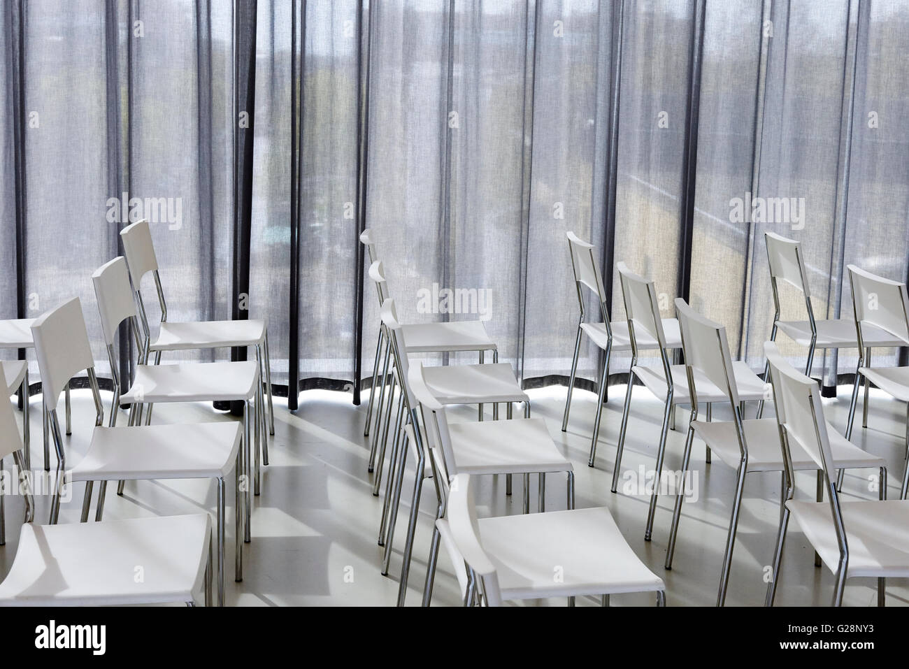 Chairs in formation Stock Photo - Alamy