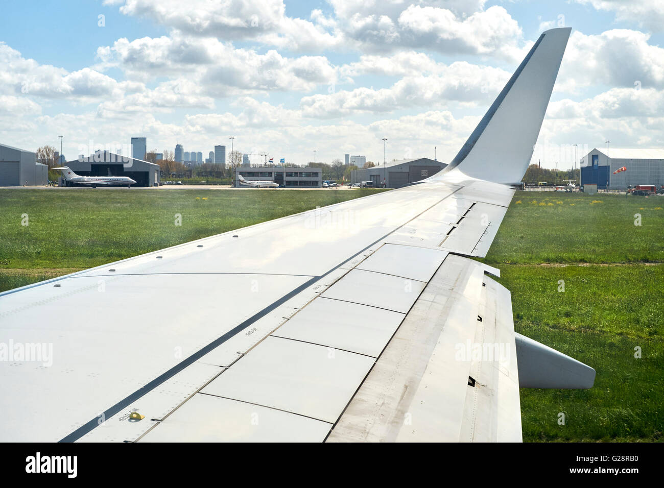 Wing of a plane during take off from Rotterdam The Hague airport Stock ...