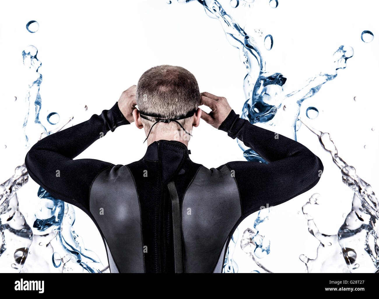 Composite image of rear view of swimmer in wetsuit wearing swimming ...