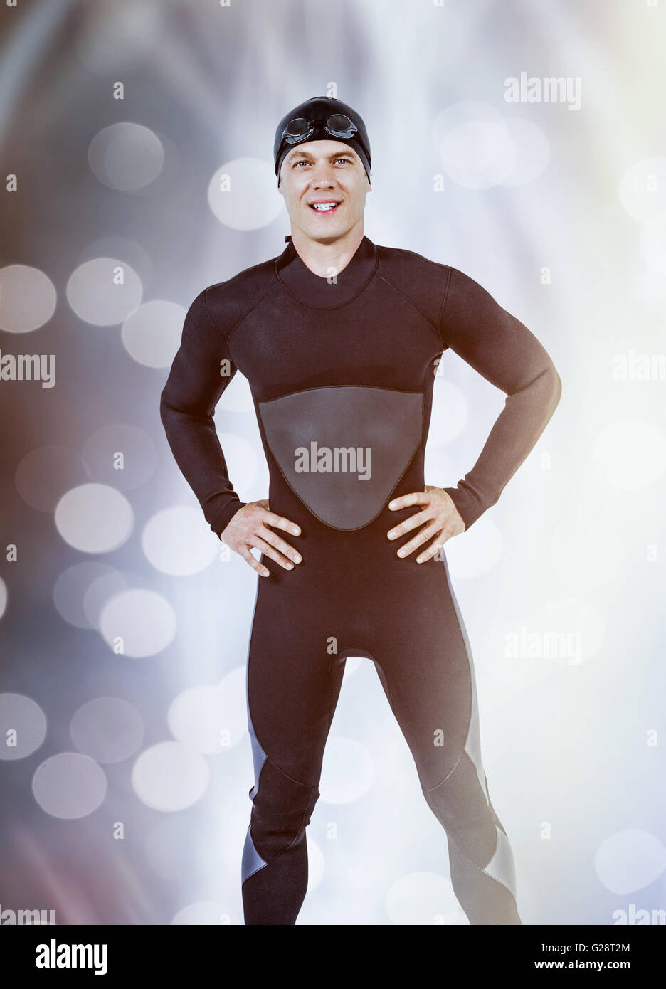 Composite image of portrait of confident swimmer in wetsuit Stock Photo ...