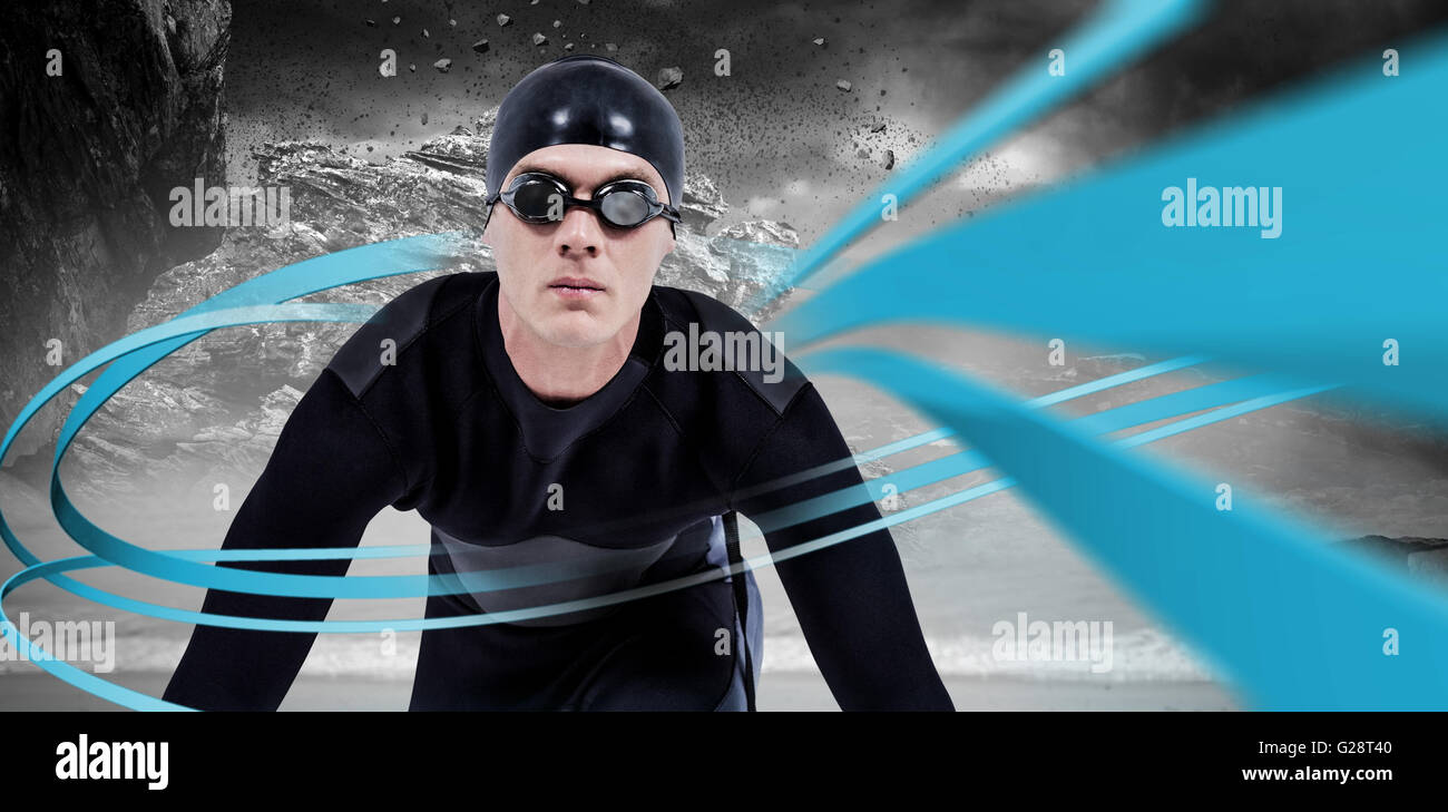 Composite image of confident swimmer in wetsuit Stock Photo - Alamy