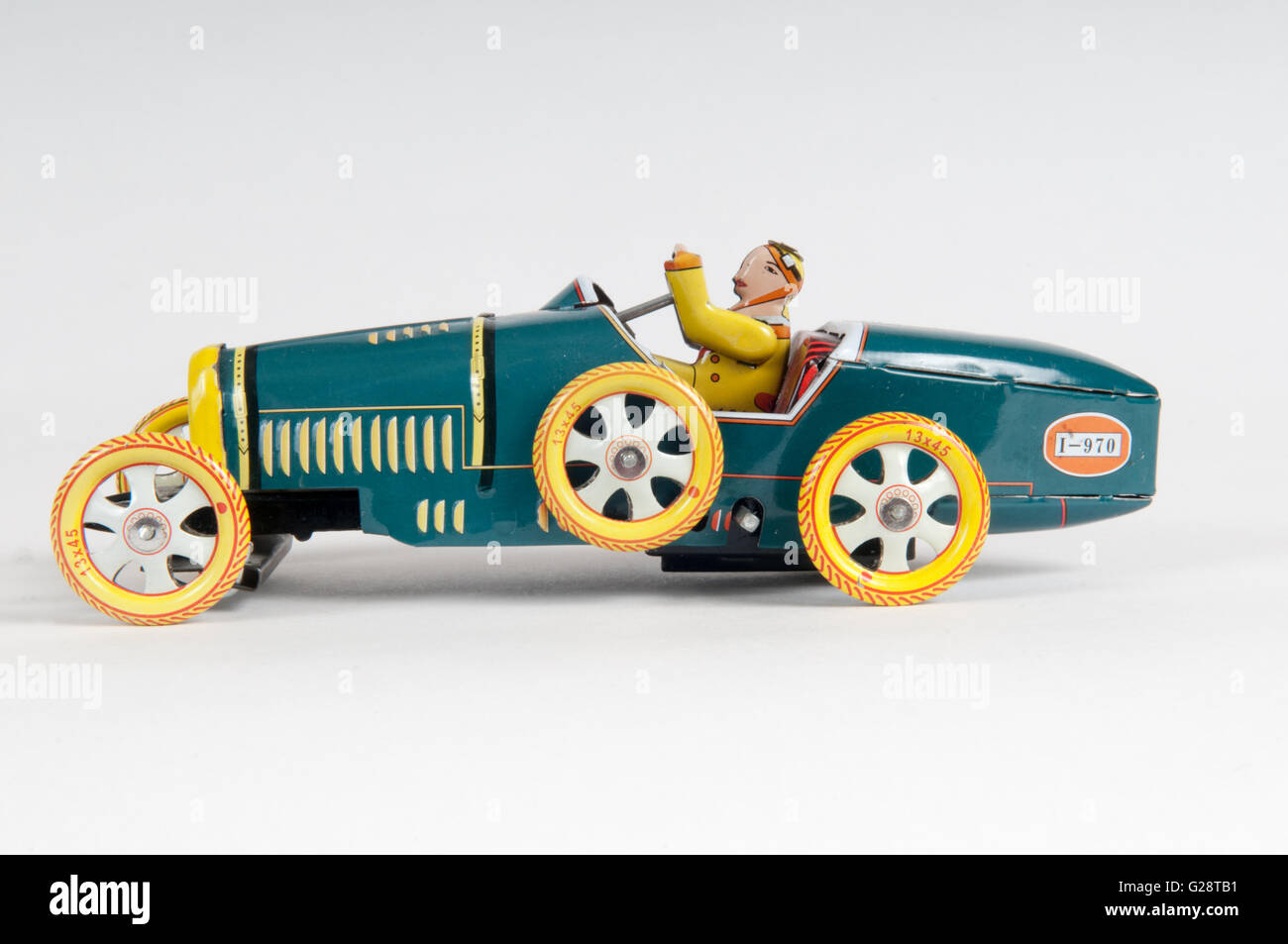 Success and achievement concept with vintage toy car wining the race ...