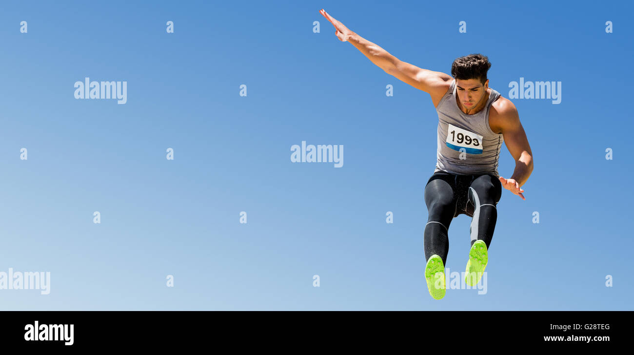 Composite image of sportsman jumping on a white background Stock Photo ...