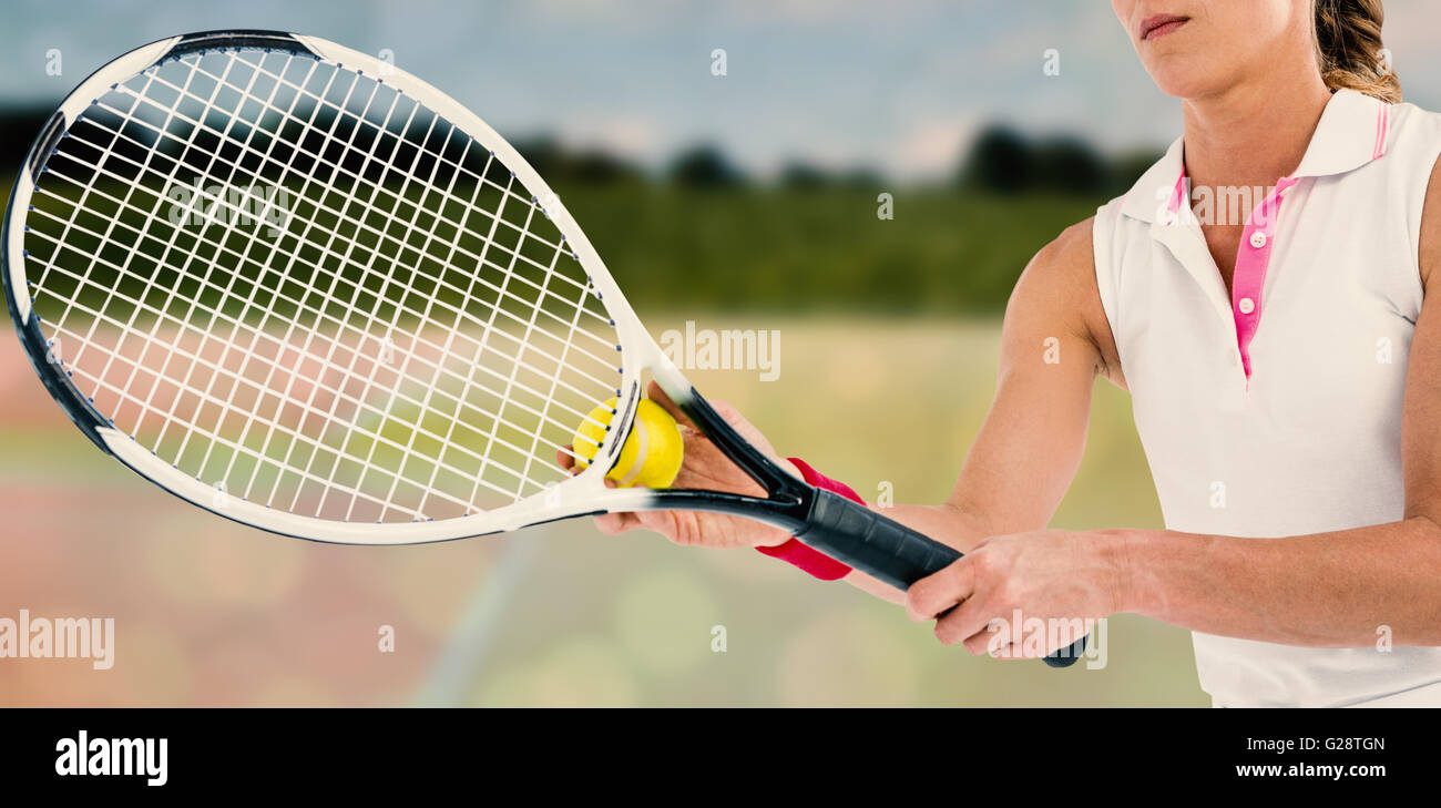 Composite image of athlete playing tennis with a racket Stock Photo - Alamy