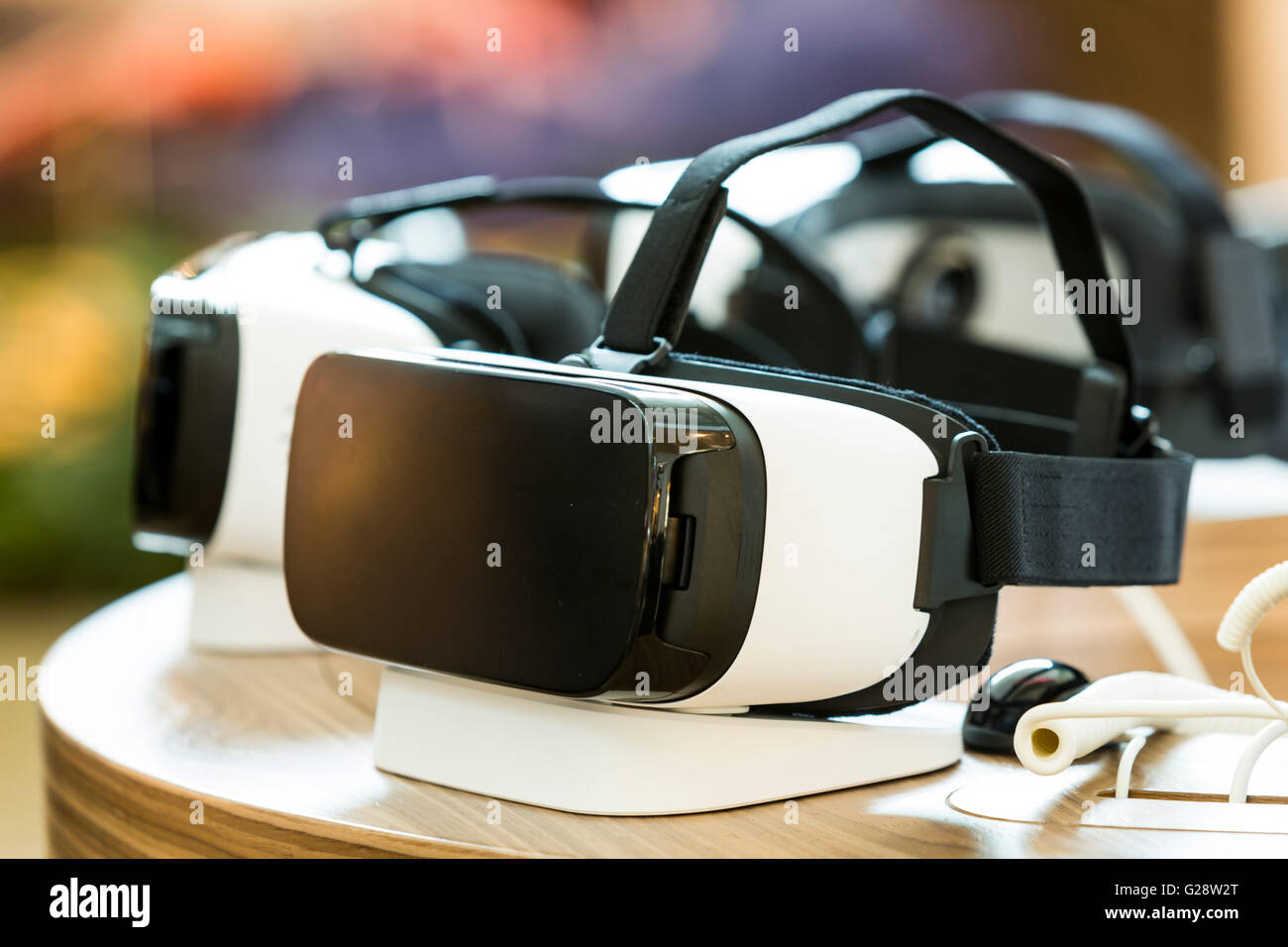 Virtual reality (VR) headsets (glasses) on a table. VR is immersive ...