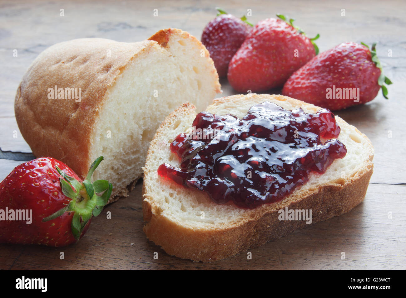 strawberries and strawberry jam on sliced bread Stock Photo - Alamy