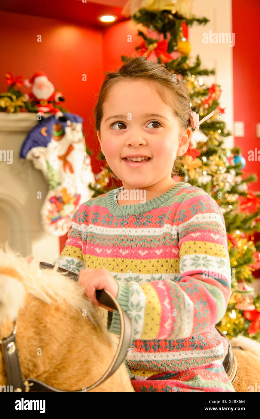Kid playing in the house at Christmas Stock Photo - Alamy
