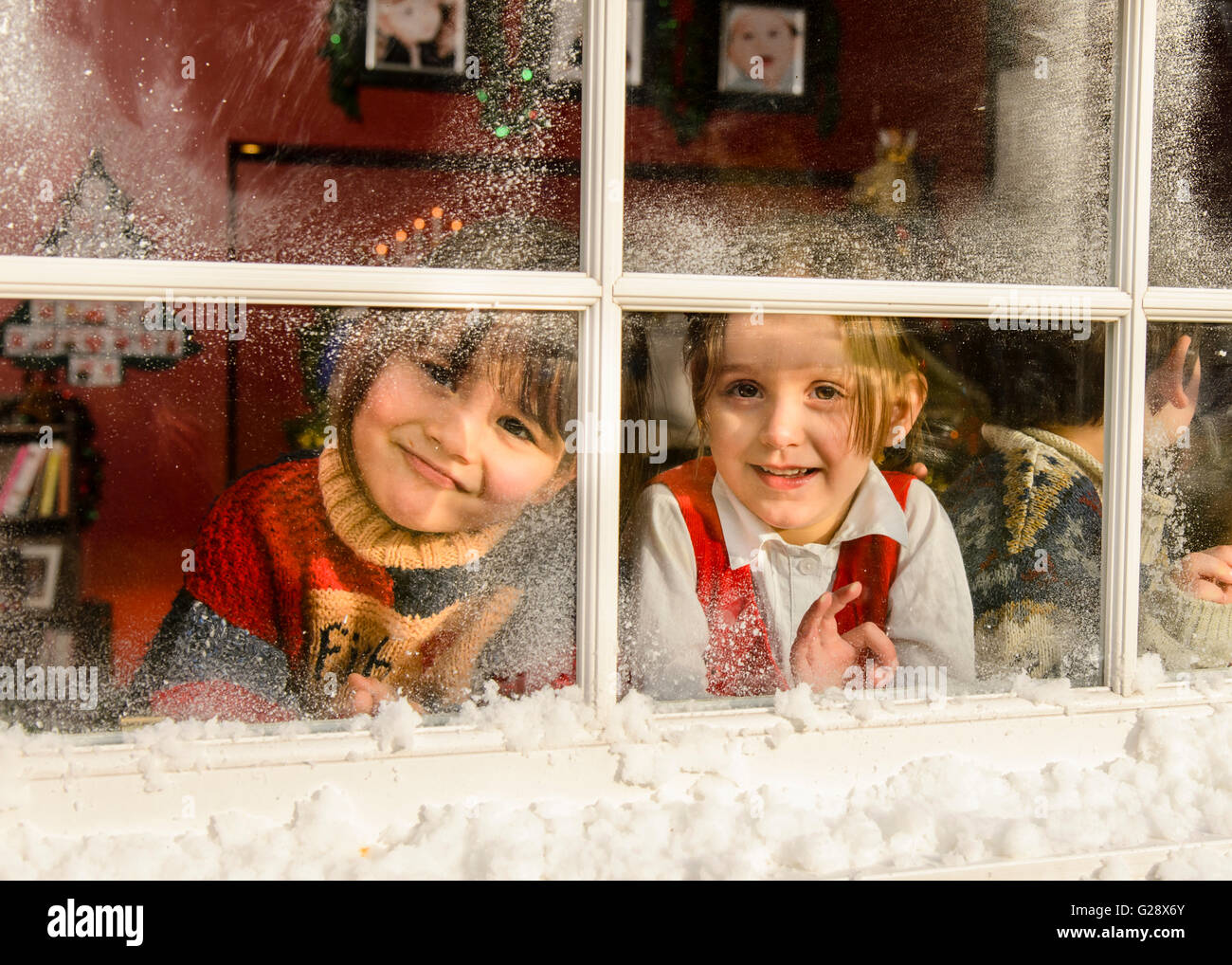 Kids playing in the house at Christmas Stock Photo - Alamy
