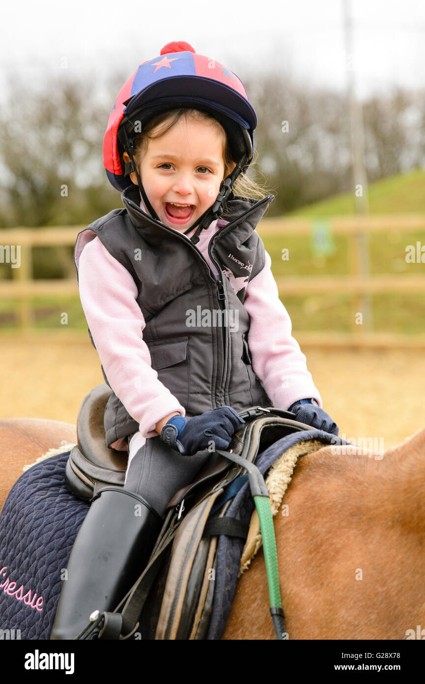 Kid horse riding hi-res stock photography and images - Alamy