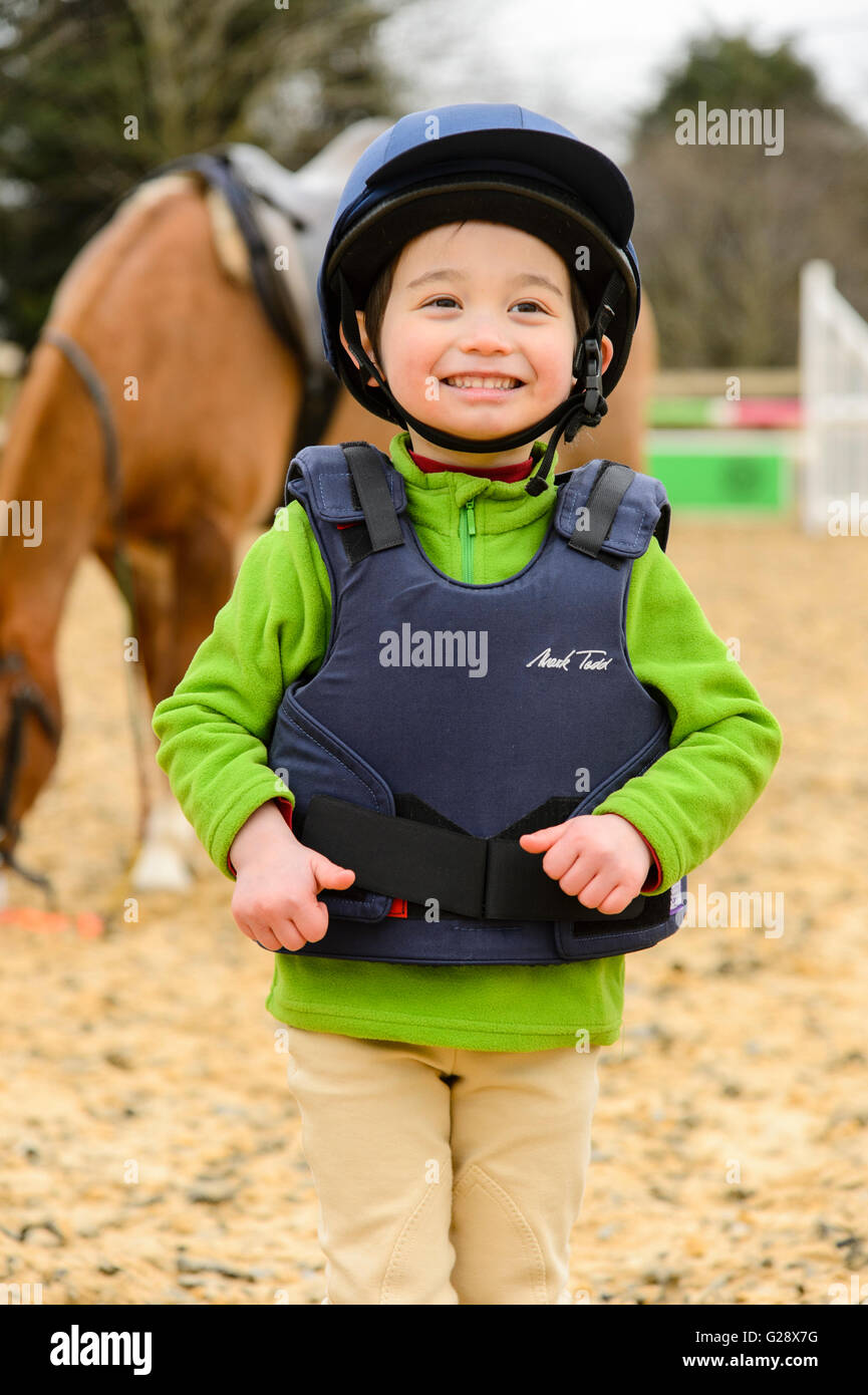 Kid with horse Stock Photo - Alamy