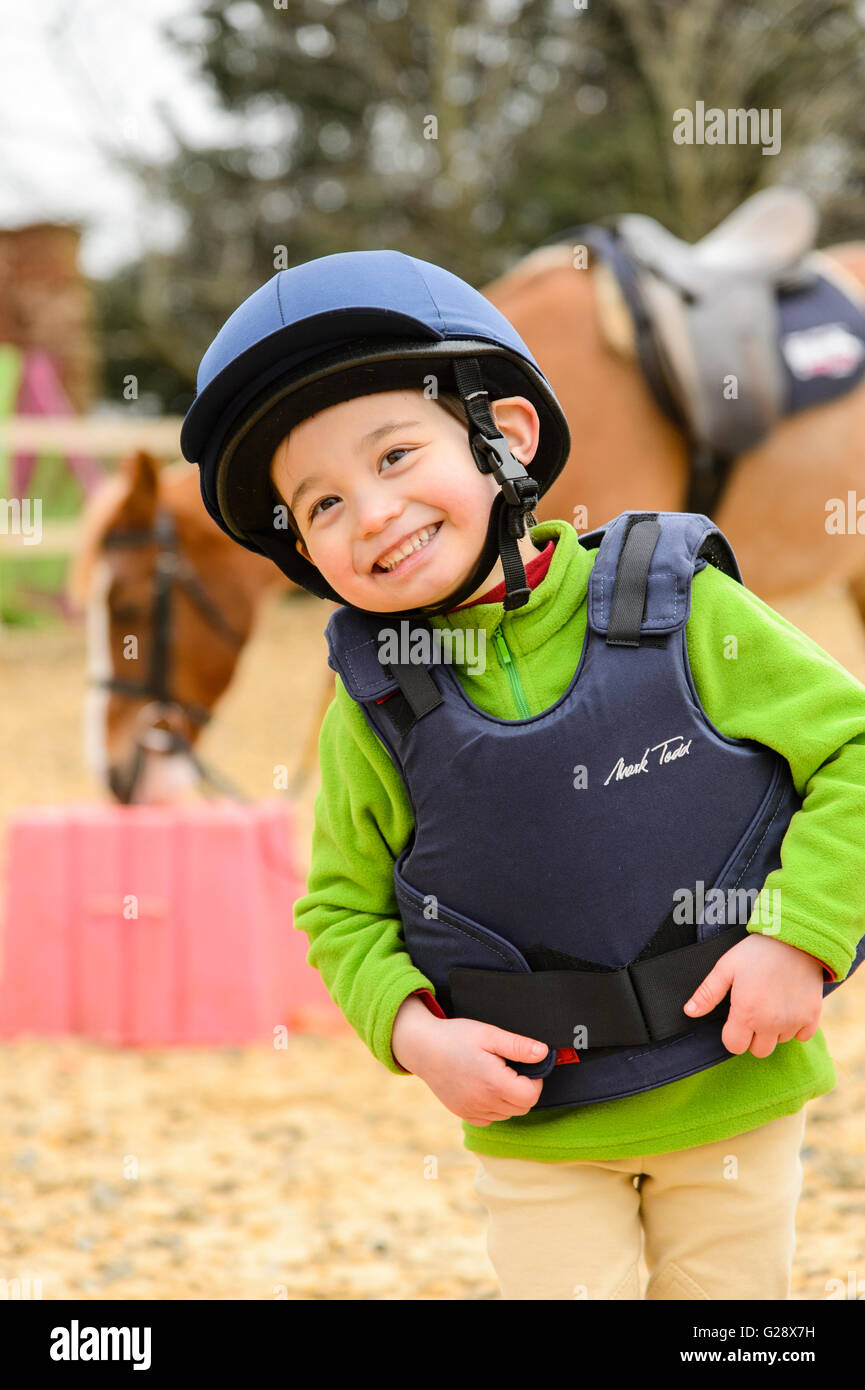 Kid with horse Stock Photo - Alamy
