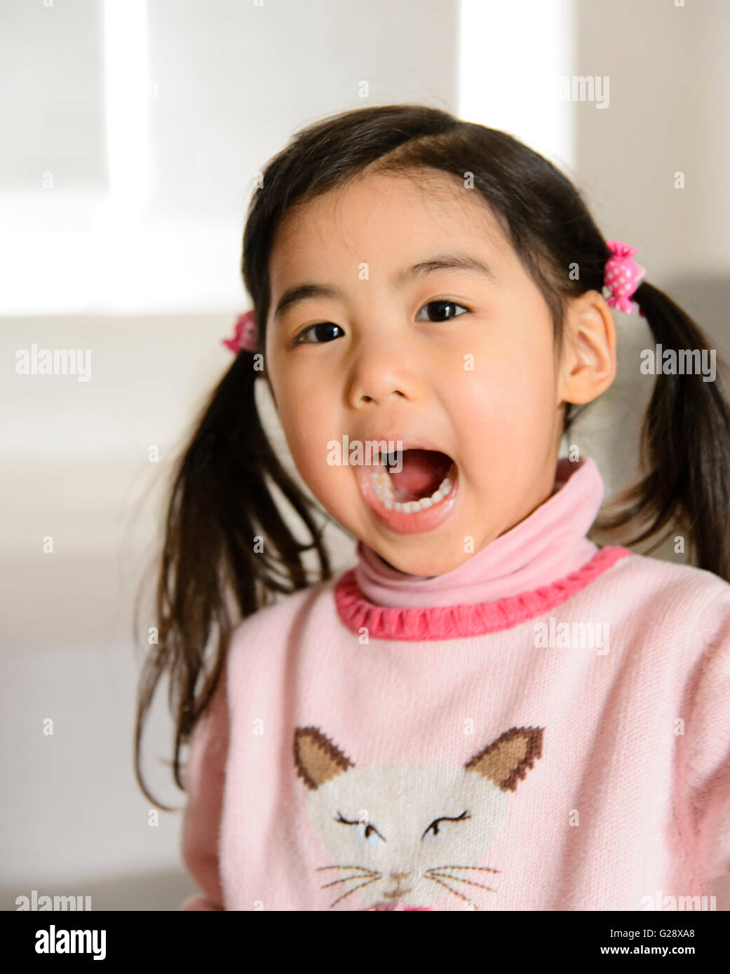 Kid playing in the house Stock Photo - Alamy