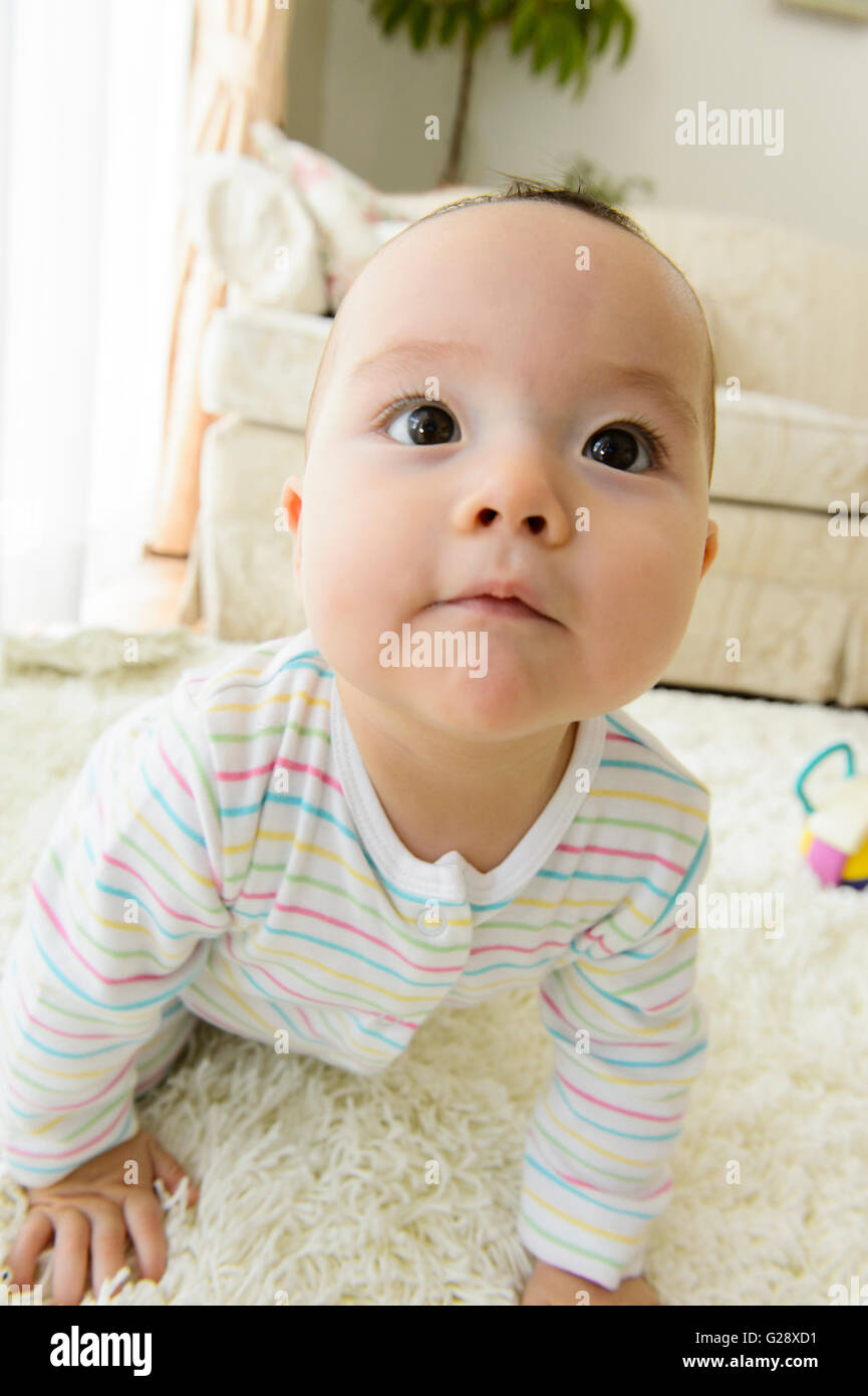 Baby in front of their house hi-res stock photography and images - Alamy