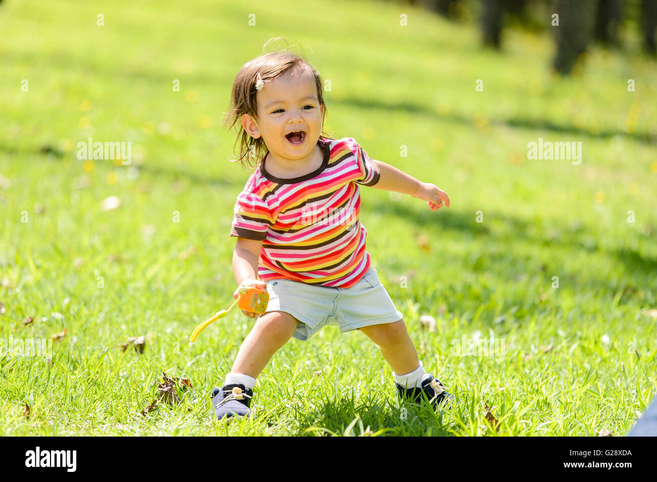 Children playing city park hi-res stock photography and images - Alamy