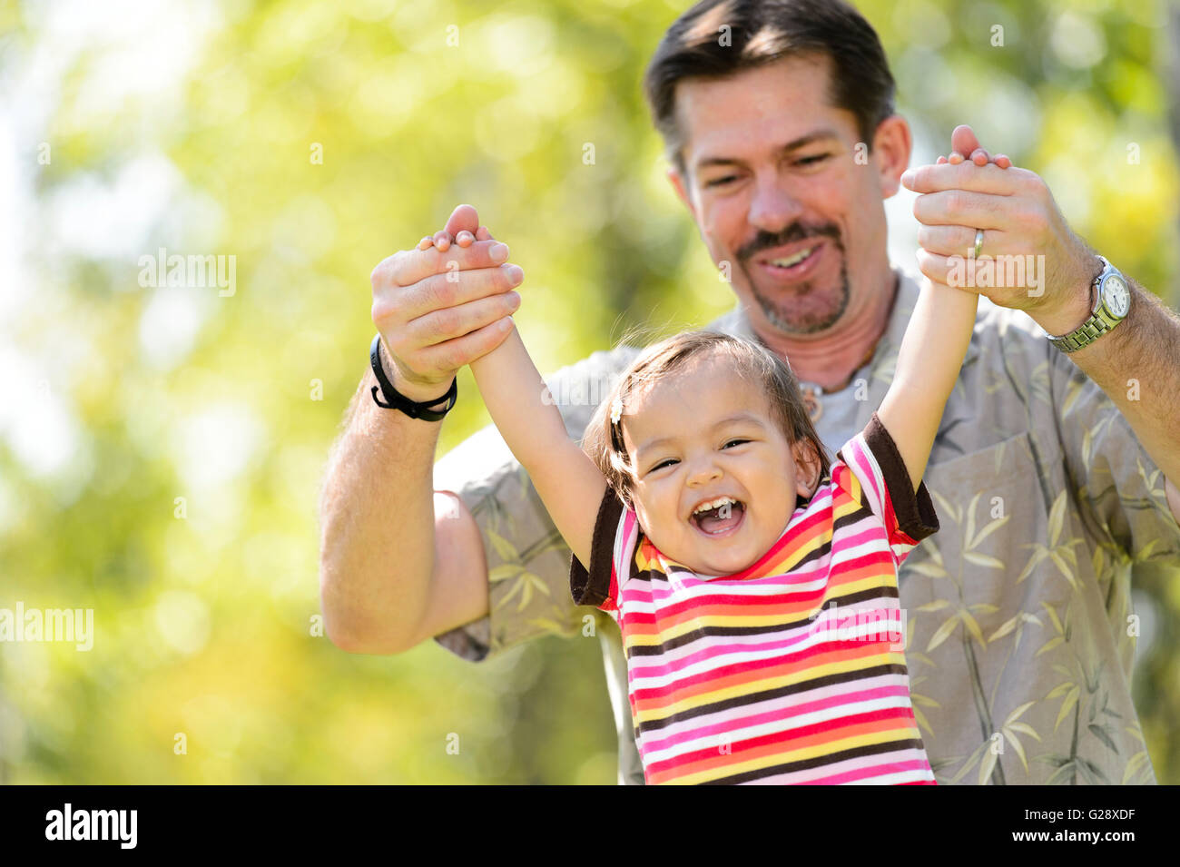 Dad looking up for kid hi-res stock photography and images - Alamy
