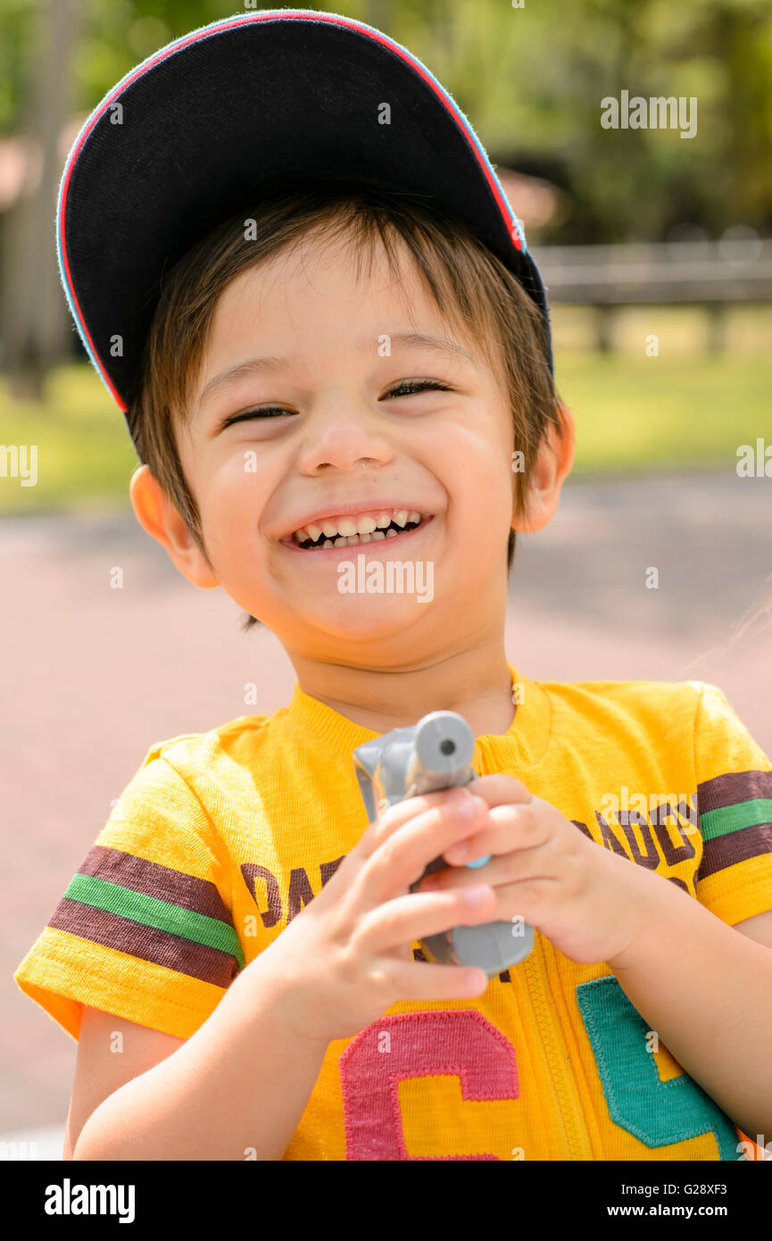 Happy children playing in park hi-res stock photography and images - Alamy