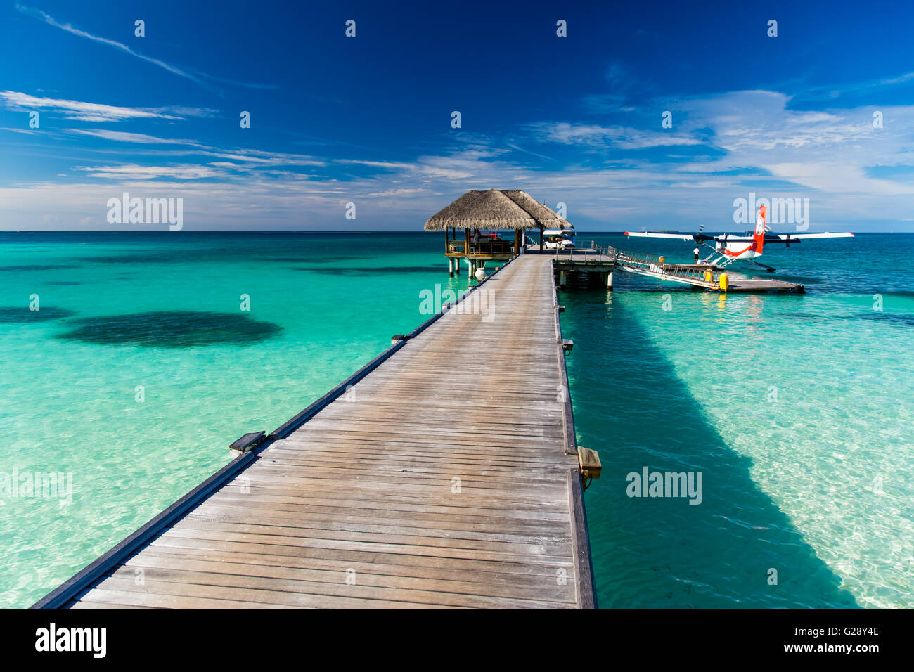Amazing beach in Maldives with luxury water villas. Exotic background ...