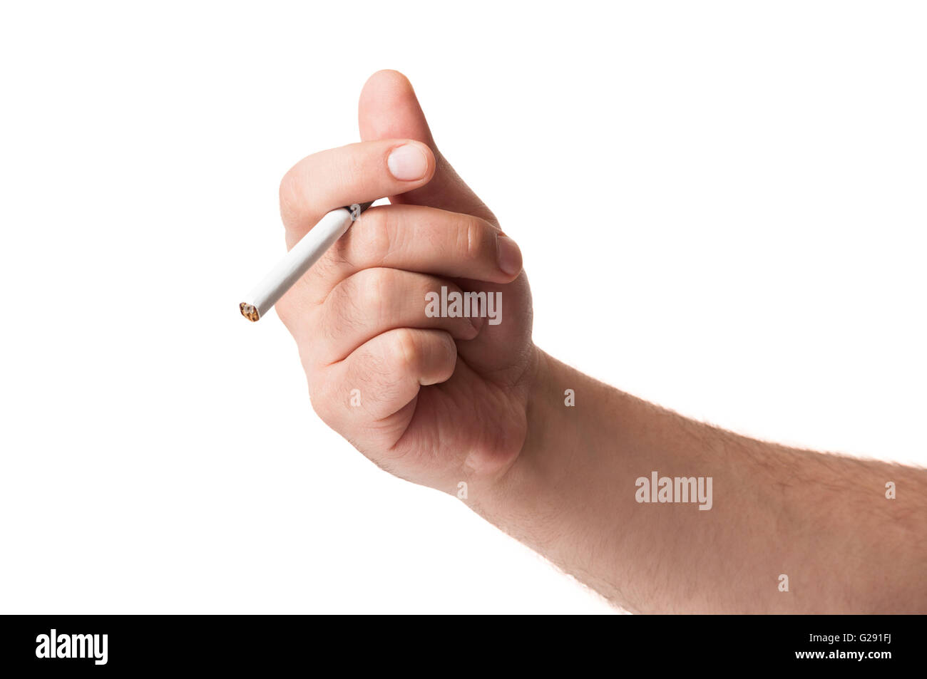 A male hand holding a white cigarette, isolated on white background ...