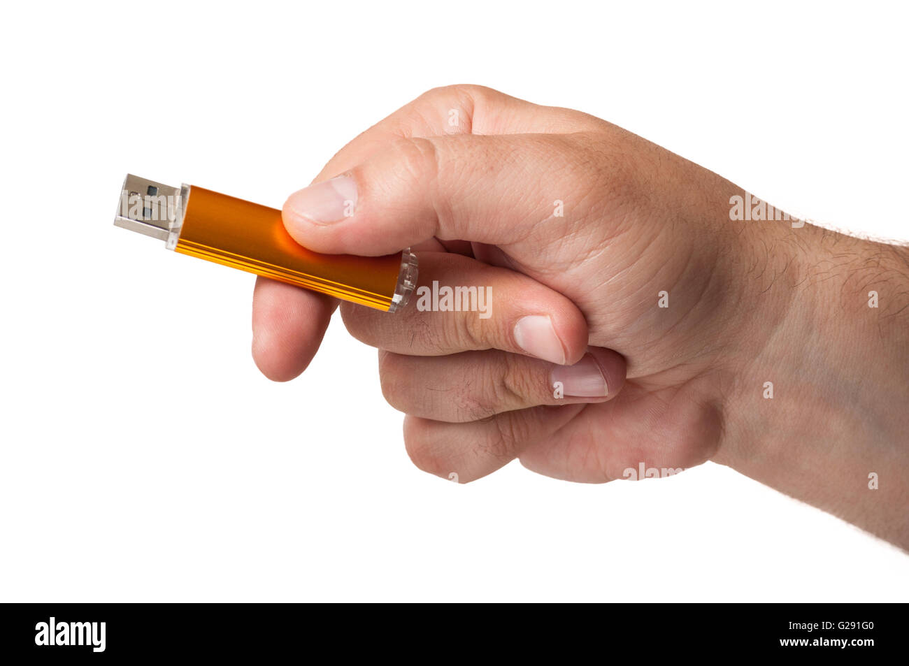 An usb memory stick ready to be plugged in a pc isolated on a white ...